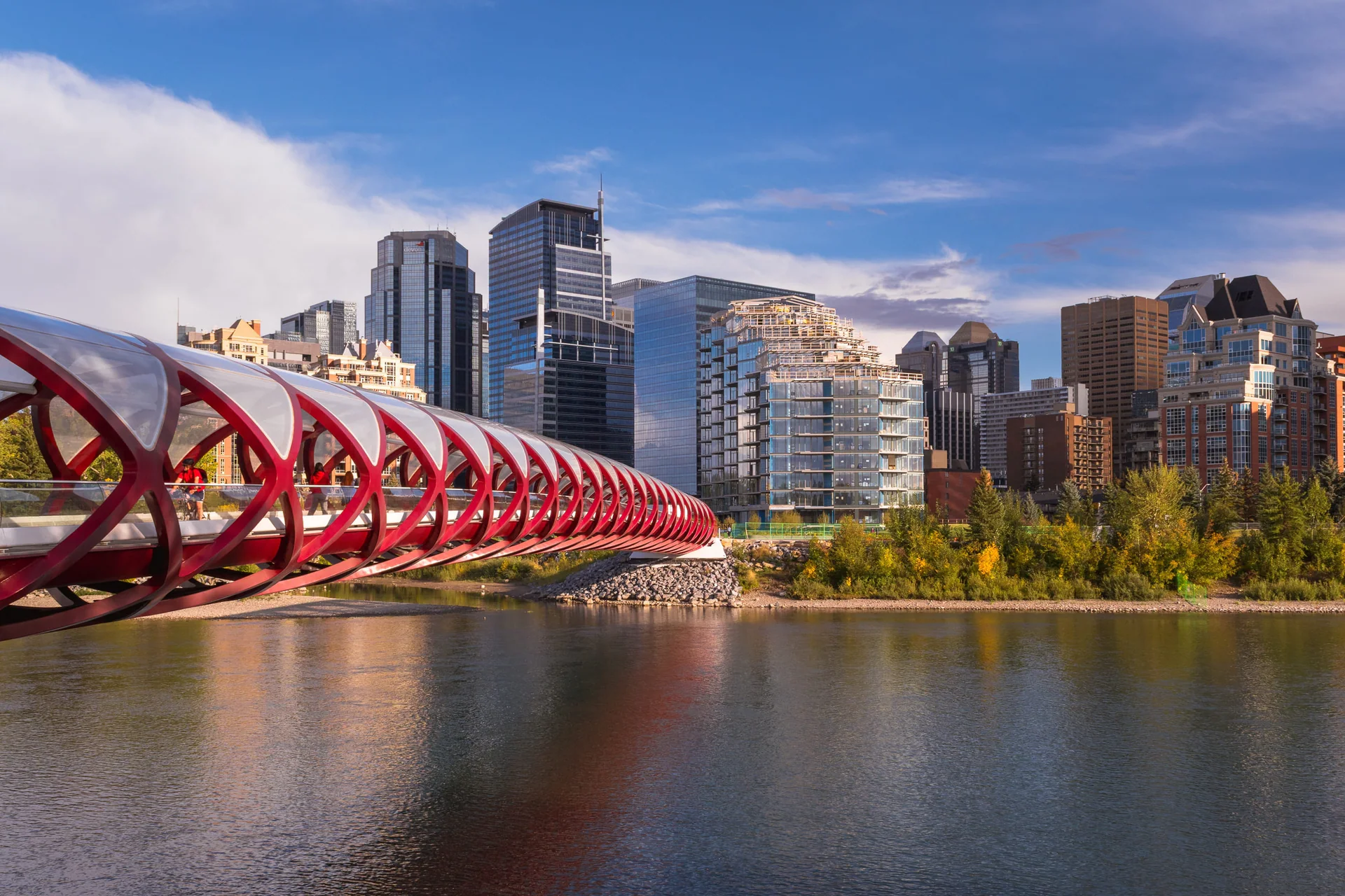 Calgary, Canada Peace Bridge and Calgary skyline over the Bow River, Alberta, Canada