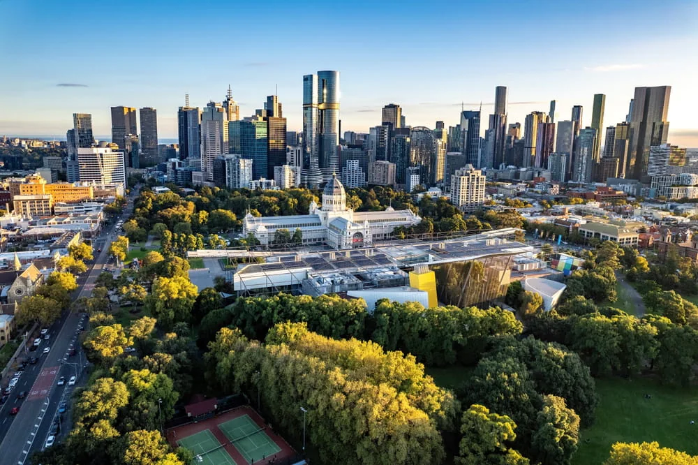 Melbourne city skyline Melbourne city skyline and Carlton Gardens with the Melbourne Museum and Royal Exhibition Building in the foreground